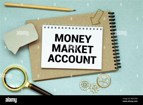 Money Market Account Written On Paper With Office Tools And Keyboard On Grey Background Stock