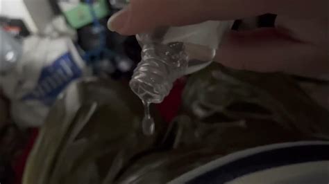 Trashing vinyl brown leggings with water and rip and cutting. - YouTube