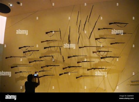 Old Rifles Inside The National Museum Of Qatar In Doha Qatar Stock