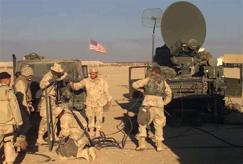 A Us Marine Corps Usmc Communications Platoon Works Around A