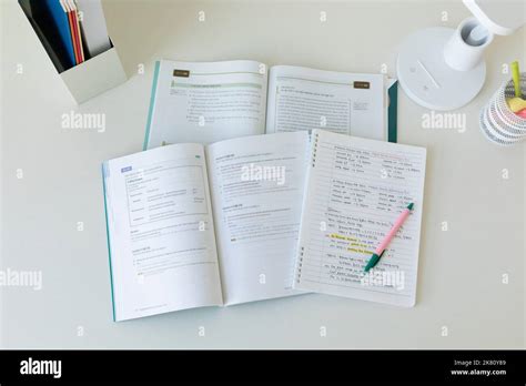Studying At Home Study Desk Setup Handwriting Notes And Open Workbooks Stock Photo Alamy