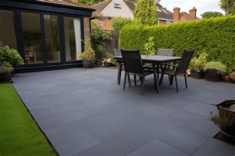 Premium Ai Image Back Garden With Artificial Grass Patio And Flower Bed