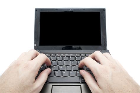 Free Stock Photo 3956-netbook typing | freeimageslive
