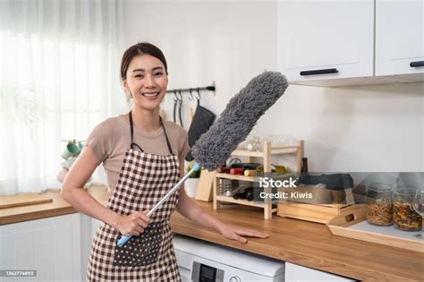 Portrait Of Asian Young Cleaning Service Woman Worker Working In House