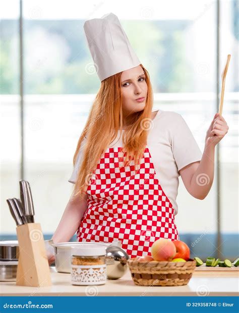 Redhead Cook Working In The Kitchen Stock Photo Image Of Garnishing Fresh