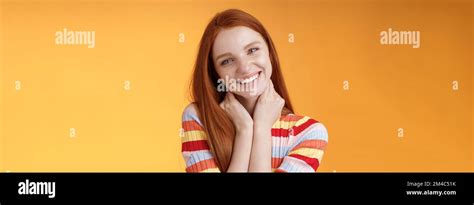 Silly Enthusiastic Attractive Redhead Blue Eyed Girl Tilting Head