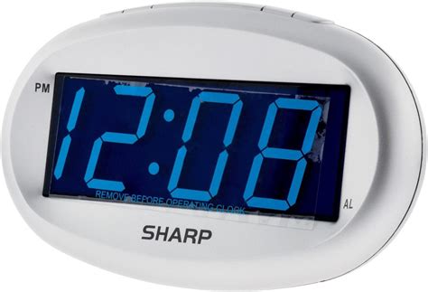 Amazon Com Sharp Blue LED Alarm Clock With Dimmer Silver Health Personal Care