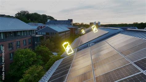 Solar Panels With Glowing Battery Icons Aerial Shot Above Solar Array