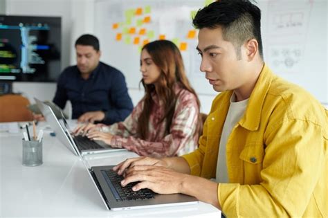 Premium Photo Panicking Devops Engineer Fixing Bugs In Programming Code
