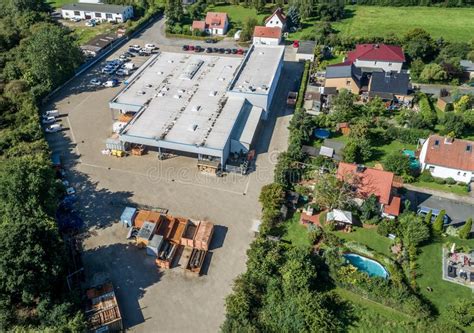 Large Industrial Hall Next To A Residential Area With Detached H Stock