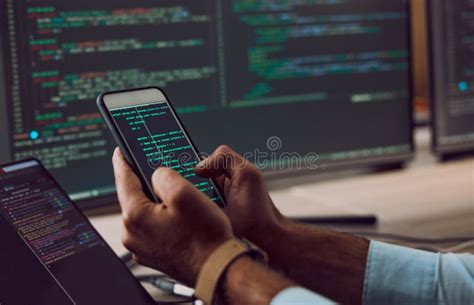 phone in hands code and man coding programmer and software update