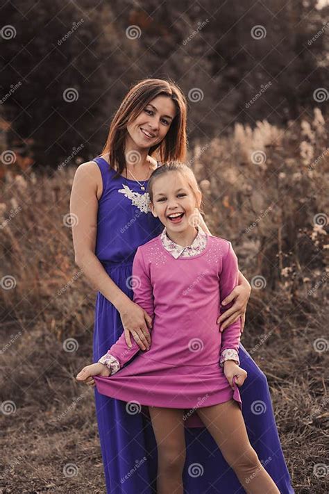 Lifestyle Capture Of Happy Mother And Preteen Daughter Having Fun