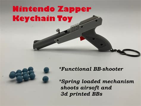 Nes Zapper Keychain Functional Bb Shooter Toy By Wonderpuddle
