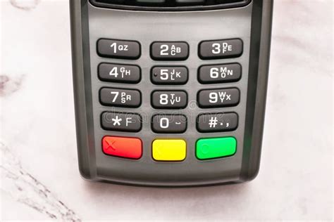 credit card pos terminal gray keypad on white background a device for conducting financial