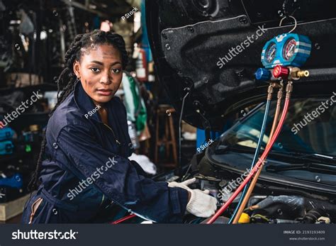 Professional Female Mechanic Analyzing Problem By Stock Photo 2193193409 Shutterstock
