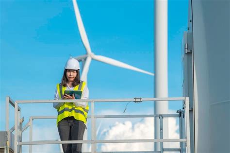 Premium Photo Women Engineer Working And Holding The Report At Wind