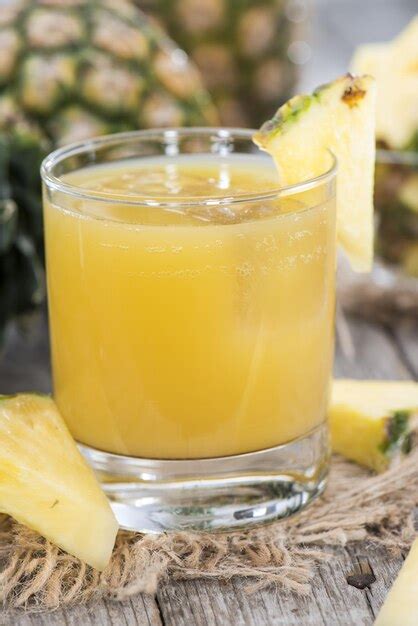 Premium Photo Portion Of Fresh Pineapple Juice