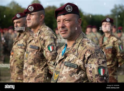 A Group Of Italian Paratroopers Stand In Formation During The Opening