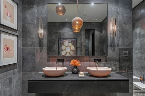 Modern Powder Room With Grey Tiles Large Square Mirrors And Wall Frames