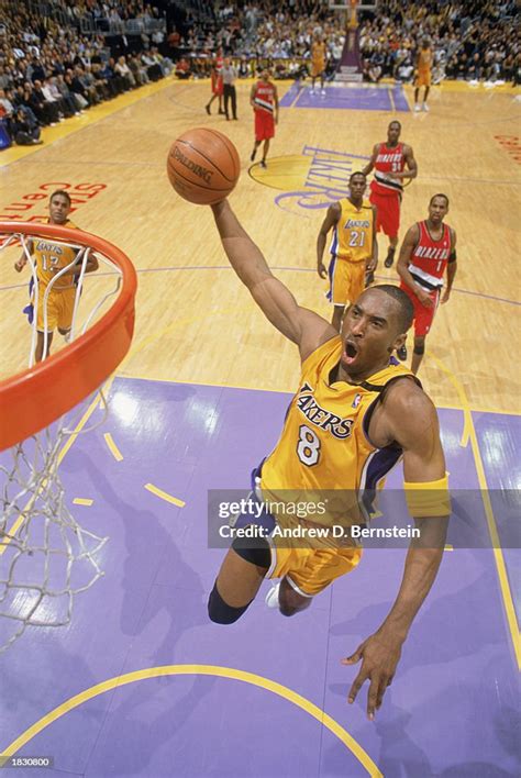 Kobe Bryant Of The Los Angeles Lakers Goes For A Slam Dunk During The
