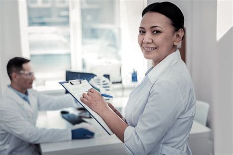 Laboratory Assistant Making Important Notes In The Laboratory Stock Laboratory Assistant Making Important Notes In The Laboratory Stock