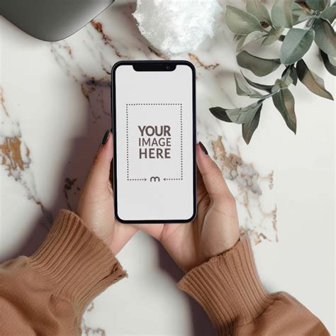 Female Hand Displaying Mobile Screen Mockup Top Perspective Mediamodifier