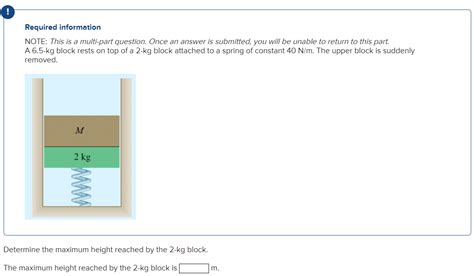 Solved A Kg Block Rests On Top Of A Kg Block Attached Chegg Com
