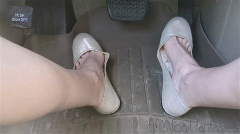 Fifi Pumping The Pedals Of The Suv In A Public Parking Lot Wearing