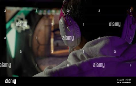 Game Streamer Using Pc Setup Playing Multiplayer First Person Shooter