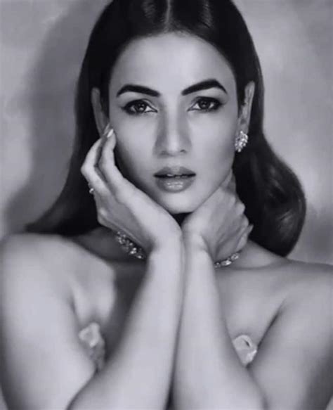 Sonal Chauhan Sizzles In Hot Silver Thigh High Slit Bodycon Gown With Plunging Neckline L Photos