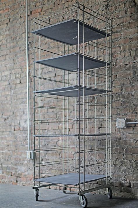 Unique Vintage Industrial Storage Foldable And Rolling Wire Bakers