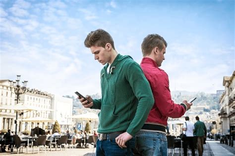 2 Hundred Couple On Phones Next Each Other Royalty Free Images Stock