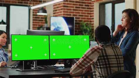 Diverse Colleagues Looking At Blank Greenscreen Template Stock Video
