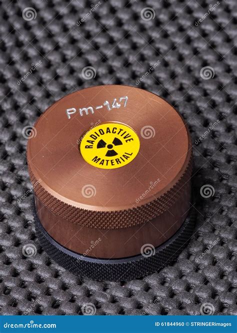 Specialist Container With Warning Sticker And Engraving Containing Radioactive Isotope Stock