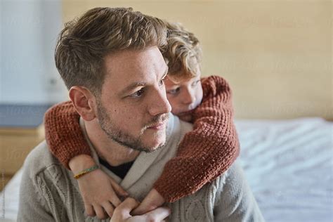 Dad And Son In A Relax And Love Moment In The Bedroom At Home By Stocksy Contributor Miquel