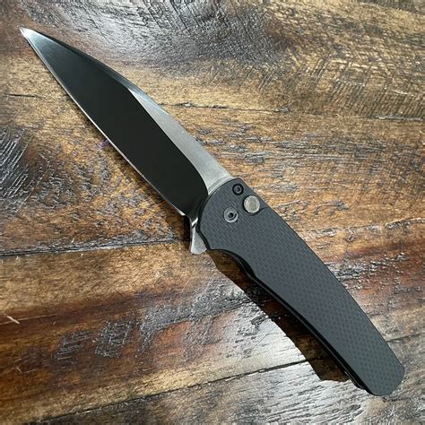 Pro Tech Malibu Button Lock Flipper Wharncliffe Textured Black Handle Mike Irie Hand Ground Two
