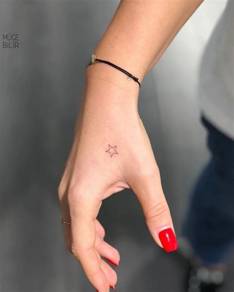 Star Tattoo On Hand Meaningful Hand Artistry With Celestial Flair