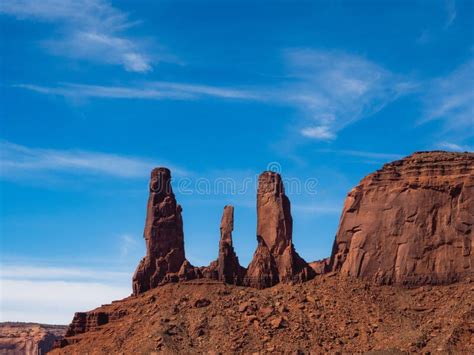 Stunning View Of Monument Valley S Iconic Rock Formations Under A Clear