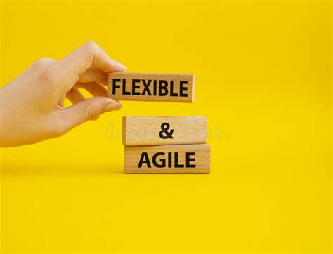 Flexible And Agile Symbol Concept Word Flexible And Agile On Wooden