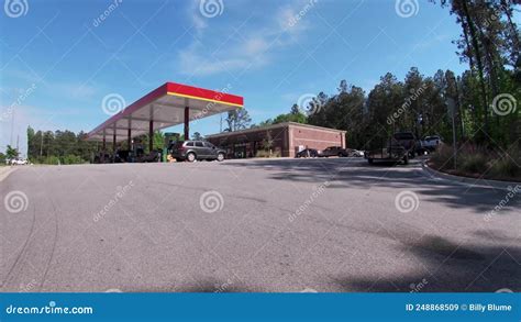 Pov Ground View Street Driving Pulling Into A Gas Station Stock Video