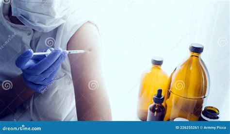 Medicine Doctor And Vaccine Dose Flu Shot Drug Syringe In Laboratory