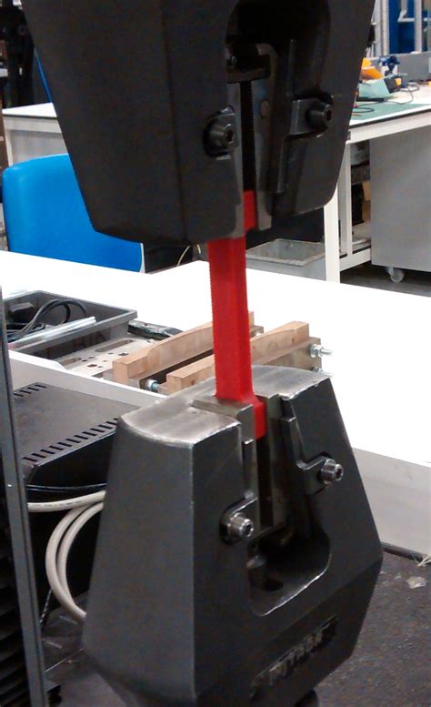 A Sample Undergoing Tensile Testing Download Scientific Diagram