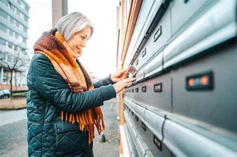 premium photo side view of woman opening lock