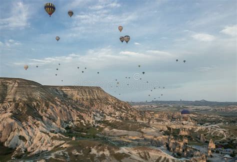 Beautiful Shot Of The Hot Air Balloons Over A Landscape In The