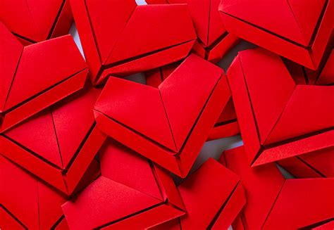 Red Paper Heart Valentines Day A Red Origami Heart On A White