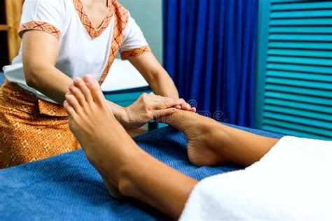 Woman Having Feet Massage In Spa Salon Stock Image Image Of Masseuse