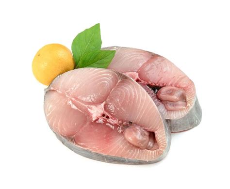 Premium Photo Spanish Mackerel Slice Or Spotted Mackerels With Lemon And Leaf Basil Isolated