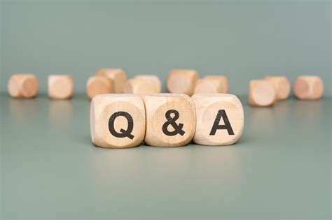 Qa Wooden Blocks Set Against A Stylish Minimalist Background For Enhanced Aesthetic Appeal