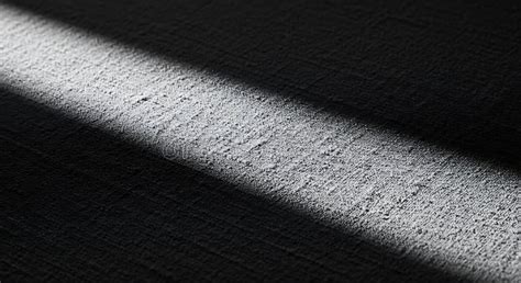 Sunlight Casting A Diagonal Shadow On Textured Concrete Surface Stock
