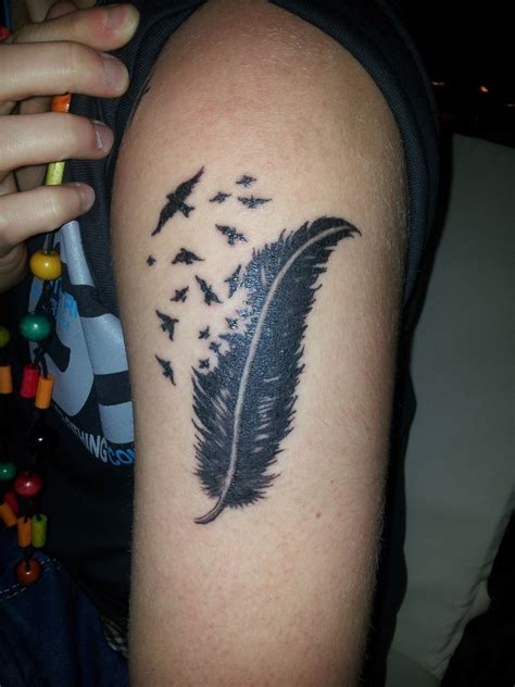 Bird Feather Tattoos Meaning Symbolism Amp Inspiration